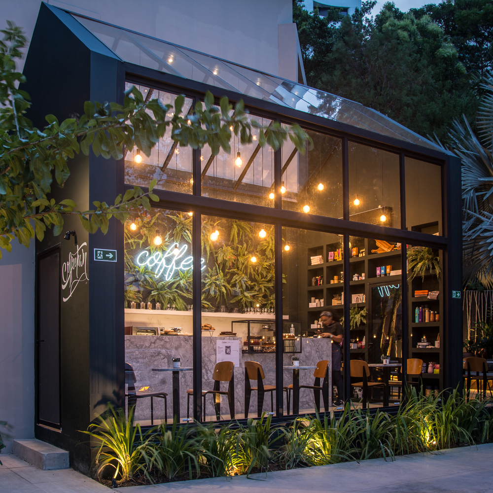 Surrounded by glass, Coffeetown café connects with surrounding gardens