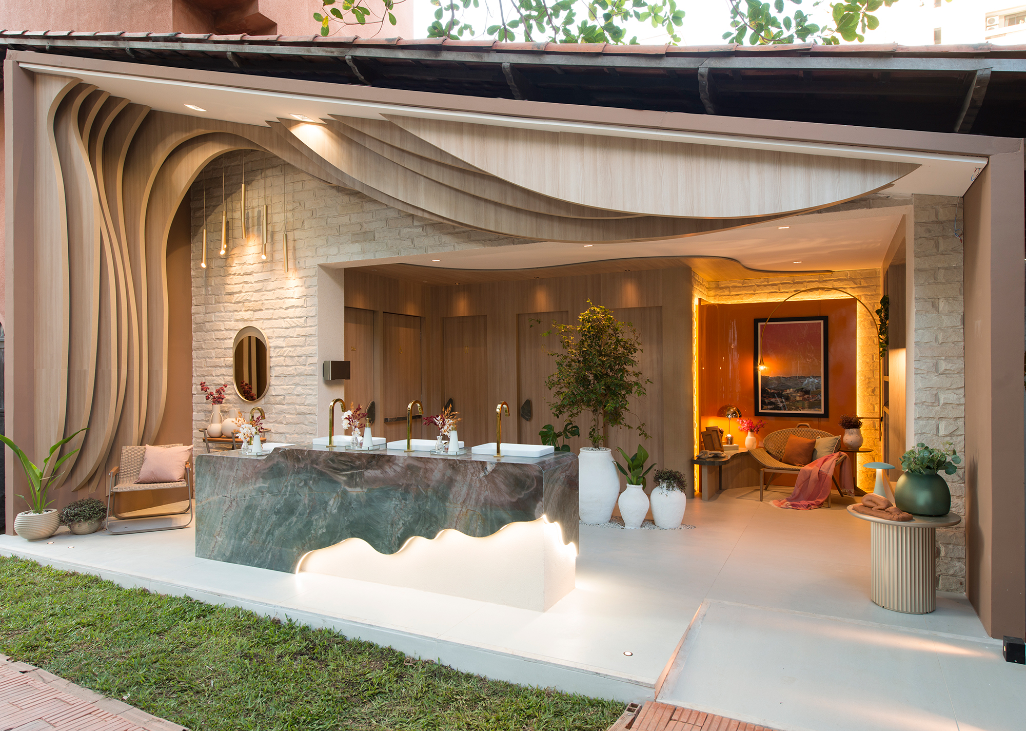 The lavatory combines organic shapes and straight lines, creating the ...